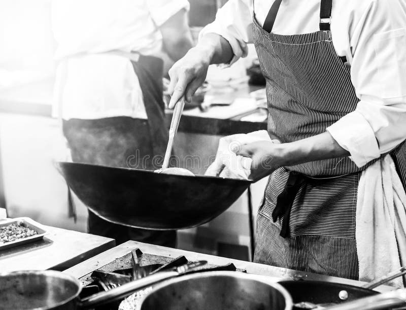 Chef Cooking in a Kitchen, Chef at Work, Black & White Stock Image ...