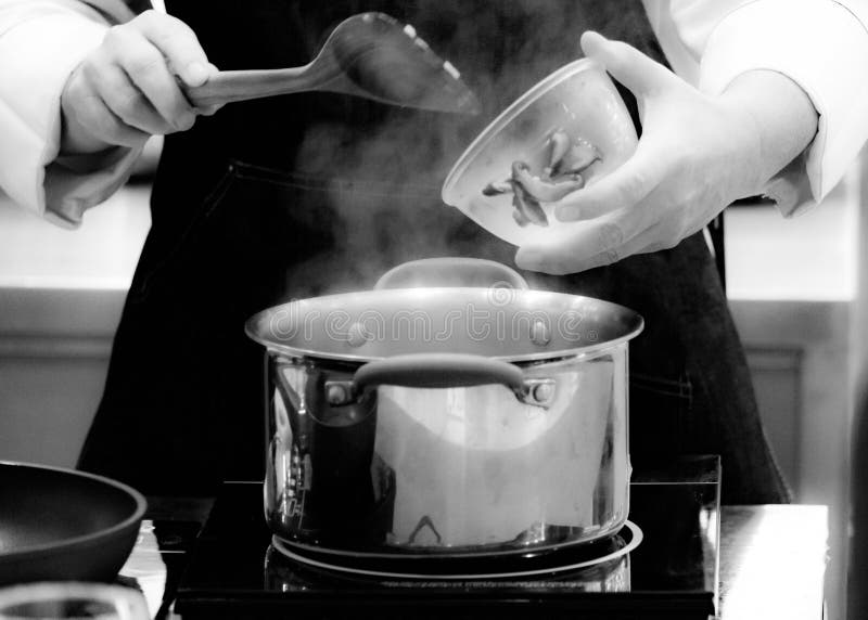 Chef Cooking in a Kitchen, Chef at Work, Black and White Stock Photo ...