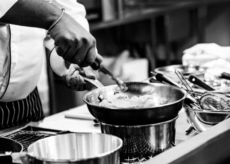Chef Cooking in a Kitchen, Chef at Work, Black and White Stock Image ...