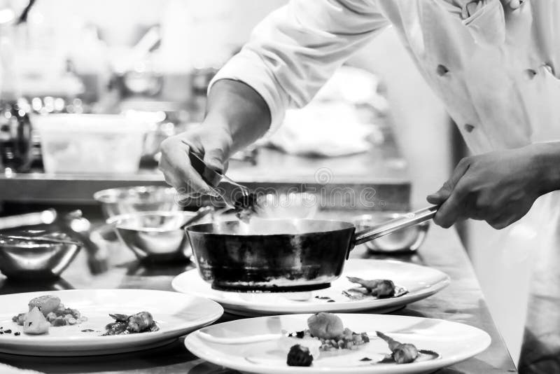 Chef Cooking in a Kitchen, Chef at Work, Black and White Stock Image ...