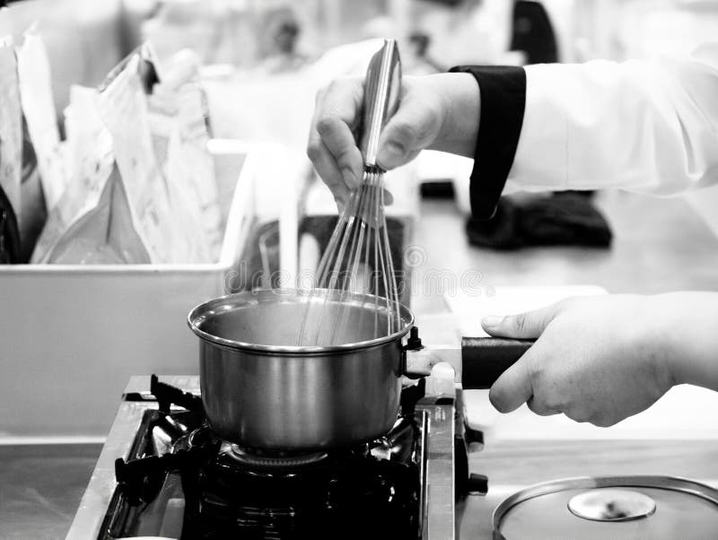 Chef Cooking in a Kitchen, Chef at Work, Black and White Stock Photo ...