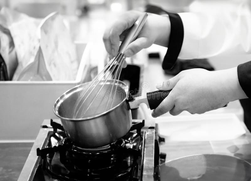 Chef Cooking in a Kitchen, Chef at Work, Black and White Stock Image ...