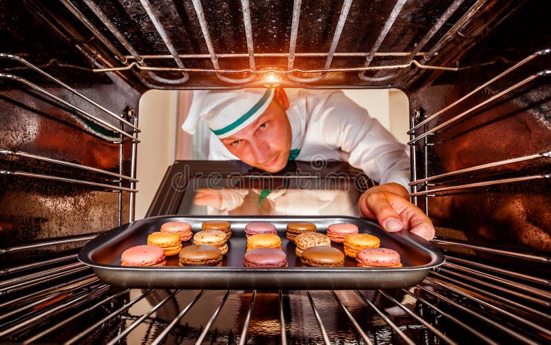 Chef cooking in the oven. stock photo. Image of brown - 57110576