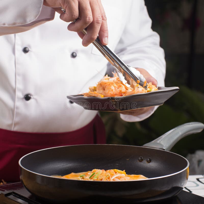 Chef cooking Pad Thai stock photo. Image of bean, ingredient - 78556356
