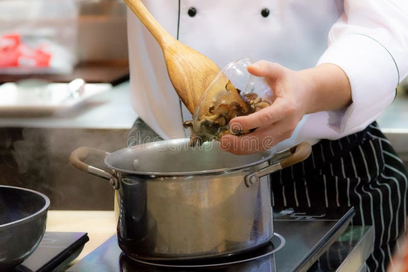 Chef Cooking Pasta in a Pot in the Kitchen, Chef Preparing Food, Meal ...