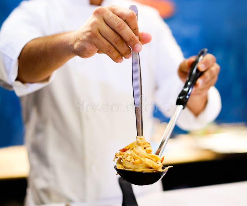 Chef Cooking Pasta, Chef Serves Spaghetti Carbonara on the Plate in the ...