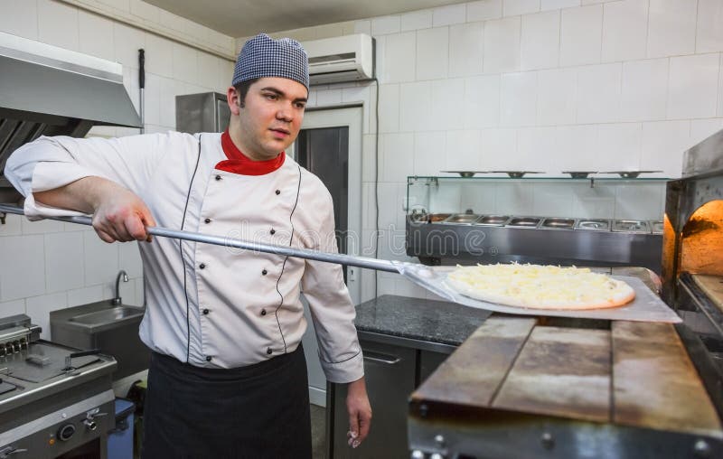 Chef Cooking Pizza stock image. Image of fast, shovel - 65264173