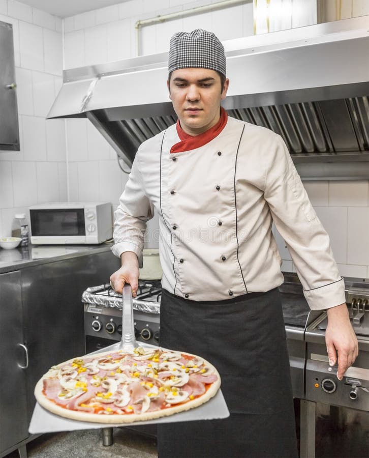 Chef Cooking Pizza stock image. Image of food, person - 65264211