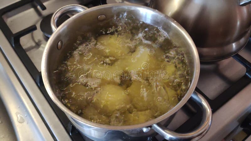 Chef Cooking Potatoes on Kitchen. Process of Cooking Potatoes Stock ...