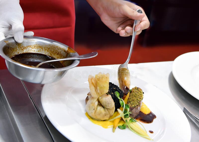 Chef Cooking, Chef Preparing Food in the Kitchen, Chef Decorating Dish ...