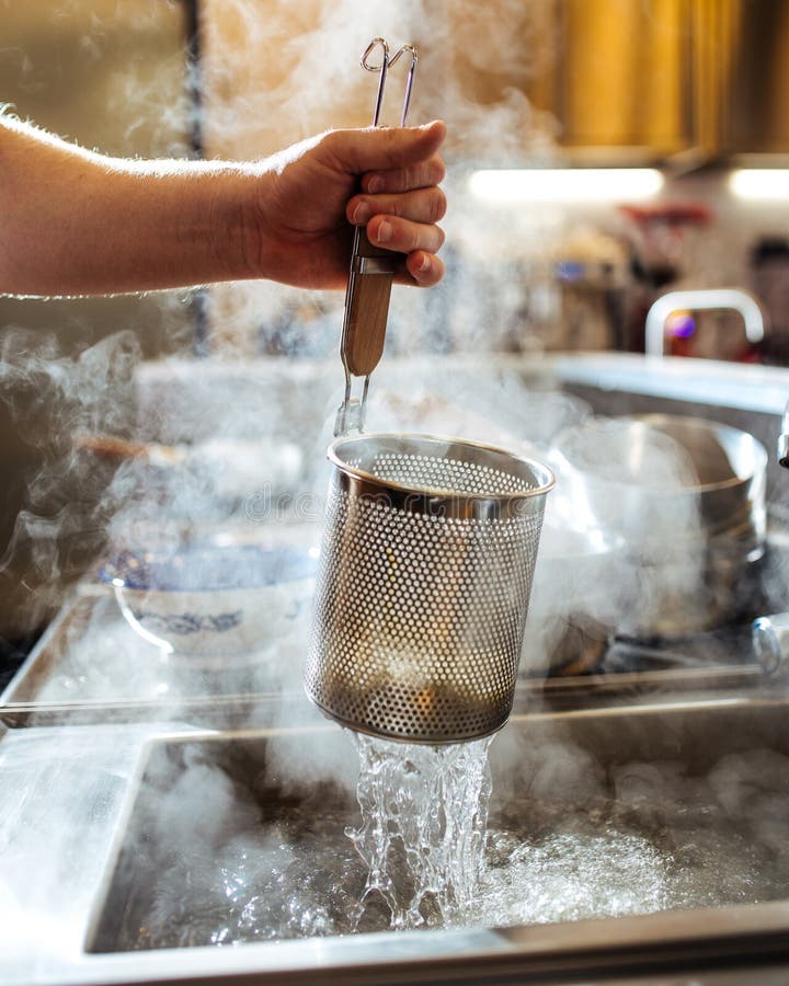 Chef Cooking Ramen Noodles in the Restaurant Kitchen, Side View ...
