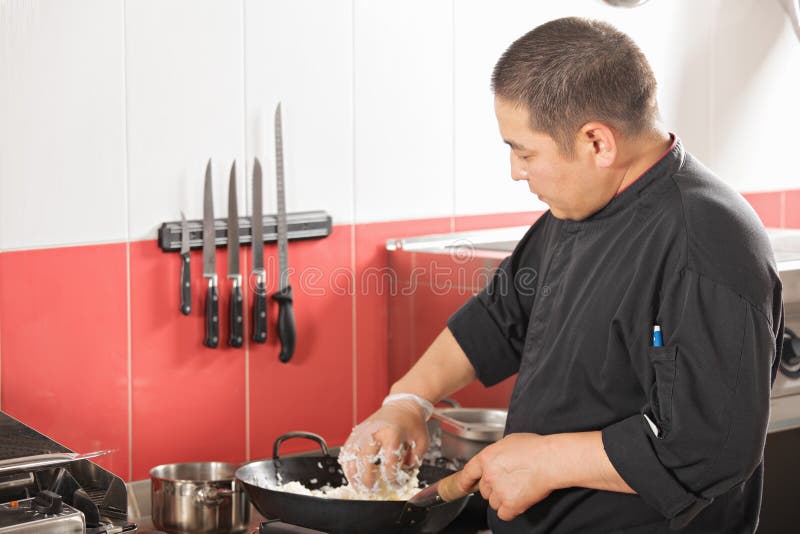 Chef cooking rice stock image. Image of professional - 44256469