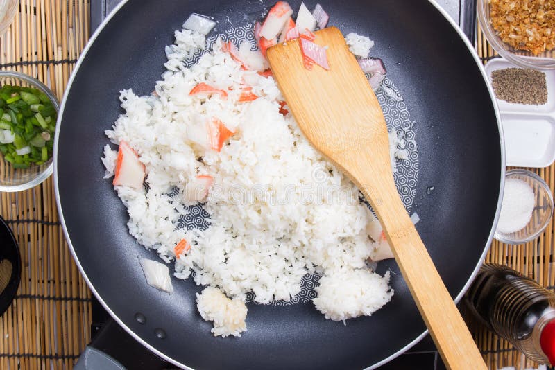 Chef cooking rice in pan stock photo. Image of food, cooking - 83431816