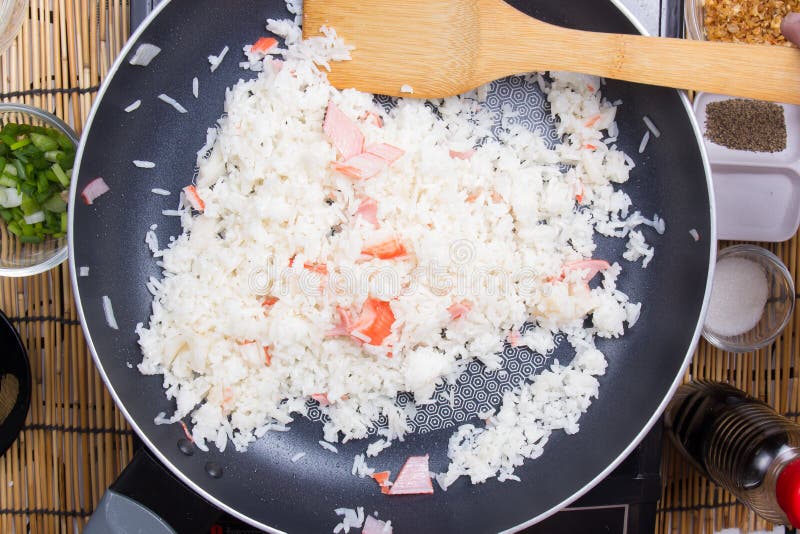 Chef cooking rice in pan stock photo. Image of gourmet - 94513736