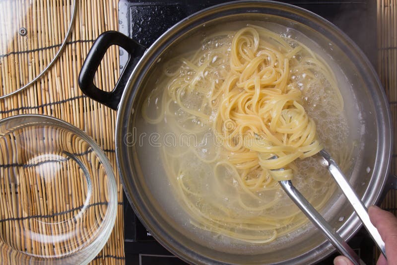 Chef Cooking Spaghetti in the Pan Stock Image - Image of plate, creamy ...