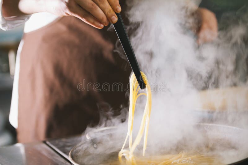 Chef Cooking Spaghetti in Restaurant Stock Photo - Image of restaurant ...