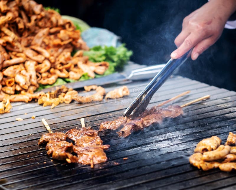 Chef cooking street food stock photo. Image of smoke - 148343778