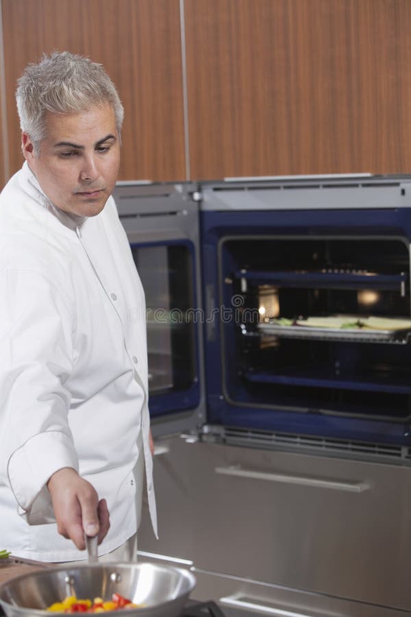 Chef Cooking Vegetables in Work Pan Stock Image - Image of cook ...