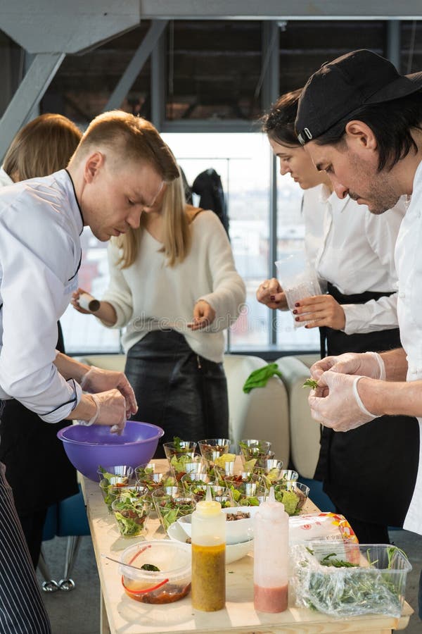The Chef Covers the Table with a Variety of Snacks Stock Image - Image ...