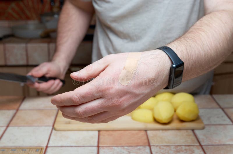 The Chef Cut His Finger while Cooking Stock Photo - Image of plaster ...