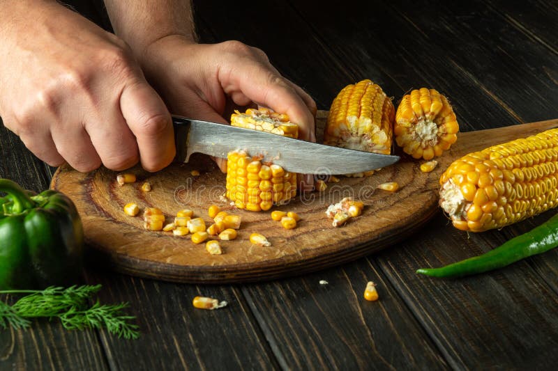 The Chef Cuts Corn Kernels with a Knife. Maize is an Excellent Dietary ...