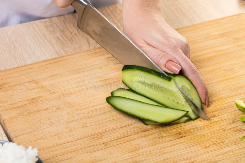 Chef cuts cucumber stock photo. Image of chopping, cooking - 105566750
