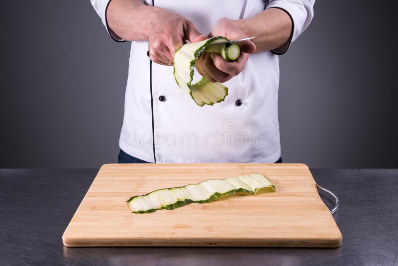 Chef Cuts Cucumber in the Restaurant Kitchen16 Stock Image - Image of ...