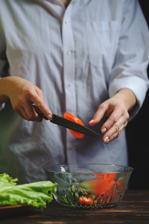 The Chef Cuts with a Knife a Vegetarian Salad Stock Image - Image of ...