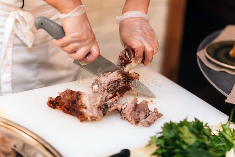 Chef Cuts Turkey Meat in Restaurant for Thanksgiving Stock Image ...