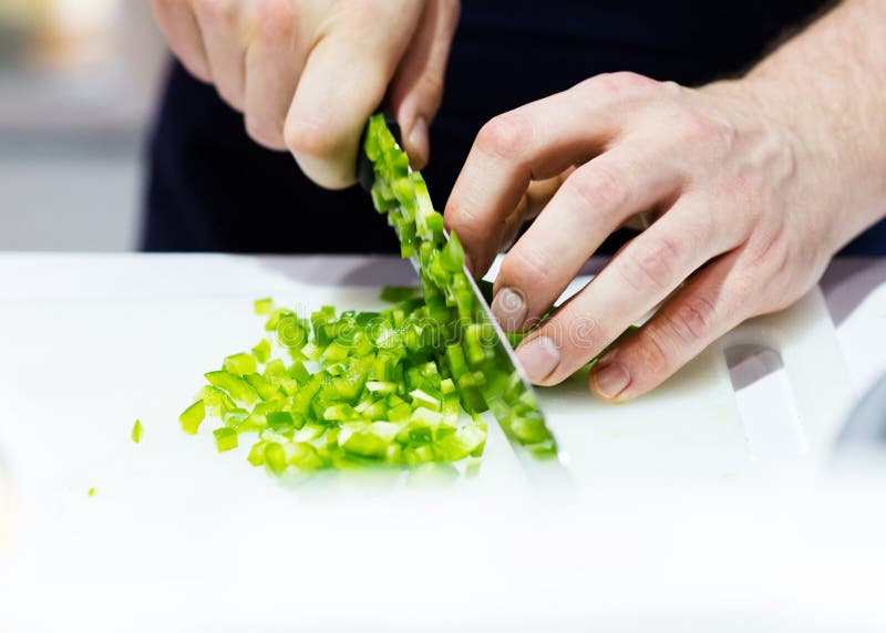 Chef Cuts the Vegetables Cooking in a Kitchen, Hands Slicing Vegetables ...