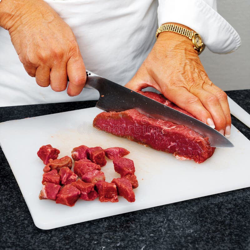 Chef cutting beef stock photo. Image of freshness, butcher - 9345782