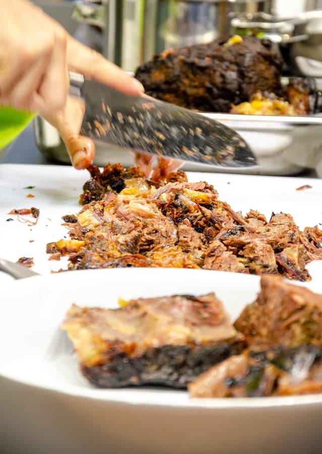 Chef cutting cooked meat stock photo. Image of chicken - 127894218