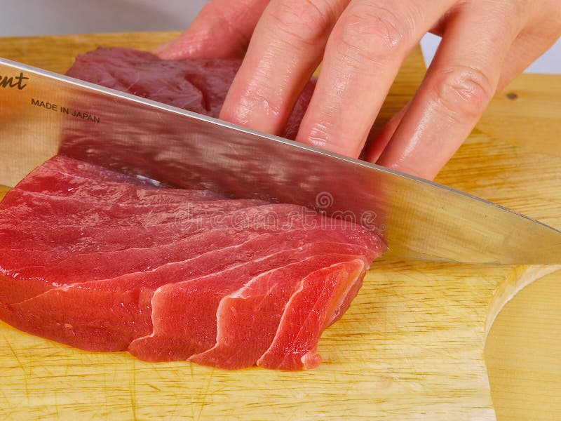 Chef cutting fresh Tuna stock photo. Image of slice, ocean - 12494472
