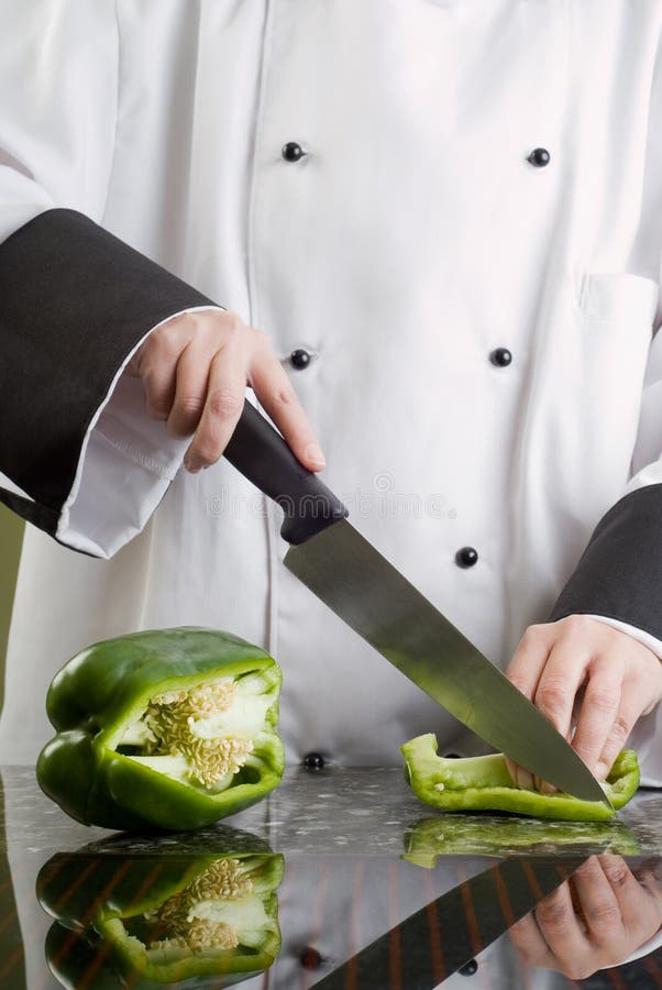 Chef Cutting Clove of Garlic Stock Photo - Image of reflection ...