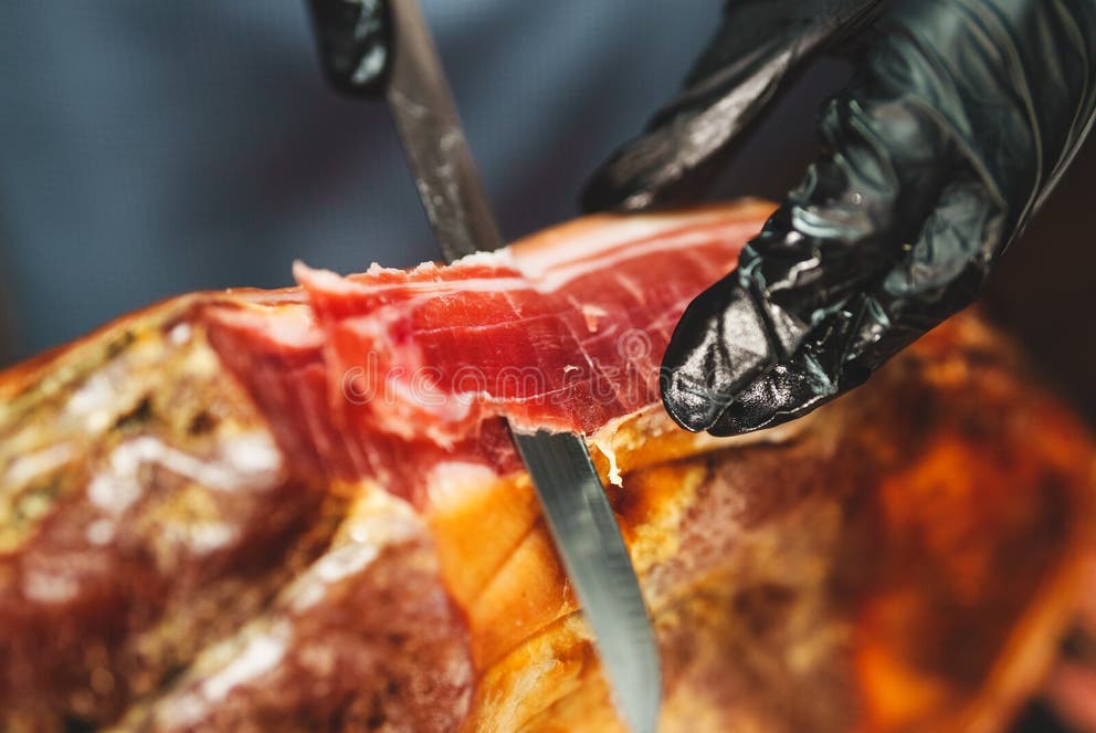 Chef cutting Jamon stock image. Image of butcher, catering - 261609289