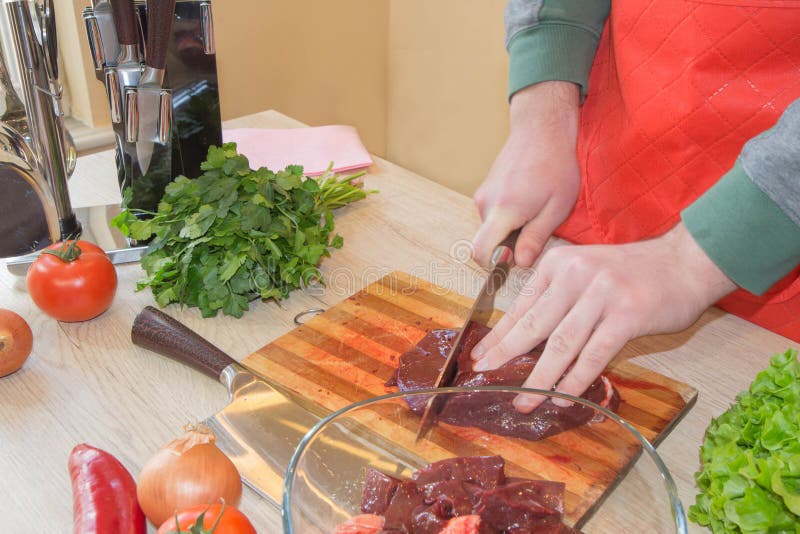 Chef Cutting Meat on Cutting Board. Chef at Work, Kitchen Stock Image ... Chef Cutting Meat on Cutting Board. Chef at Work, Kitchen Stock Image ...