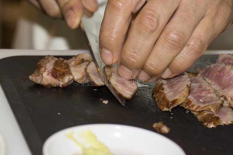 Chef cutting meat stock photo. Image of ingredients, food - 46015962