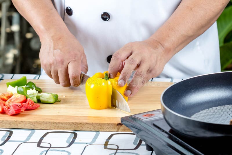 Chef cutting pepper stock image. Image of meal, salad - 66493393