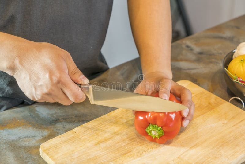 Chef Cutting Red Bell Pepper on Wooden Broad Stock Image - Image of ...