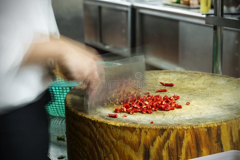 Chef is cutting Red pepper stock photo. Image of cutting - 78353698