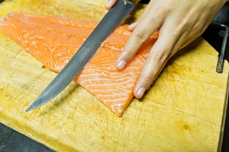 Chef Cutting Salmon Fish On Fillets Stock Image - Image of culinary ...
