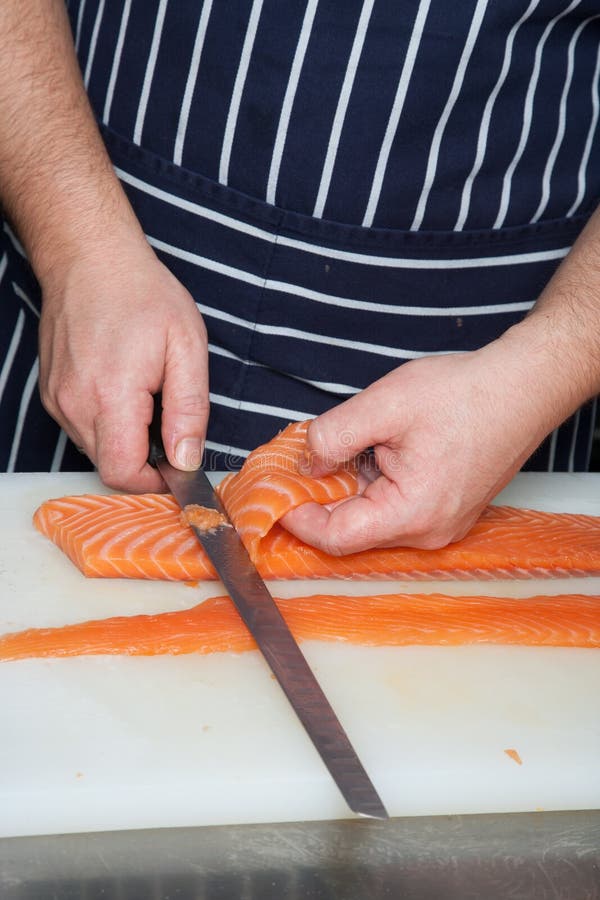 Chef Cutting Salmon Fish on Fillets Stock Image - Image of fish, hands ...