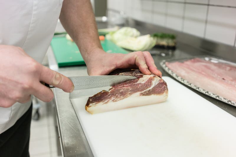 Chef Cutting Vegetables in His Restaurant Kitchen Stock Image - Image ...