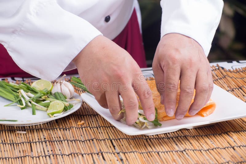 Chef Decorated Pad Thai on Plate Stock Photo - Image of cuisine, leek ...