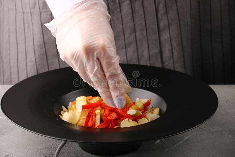 Chef Decorates Pasta. Italian Food. Chef Decorating Plate. Kitchen ...