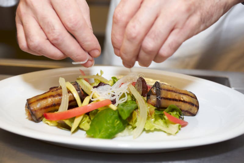 Chef is Decorating Appetizer Dish Stock Photo - Image of roll, garnish ...