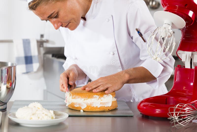 Chef decorating cream stock photo. Image of closeup, garnish - 74424956