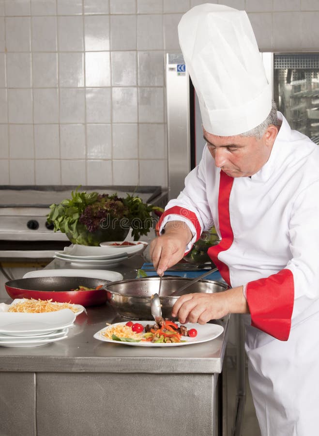 Chef decorating plate stock image. Image of holding, nutrition - 25735219