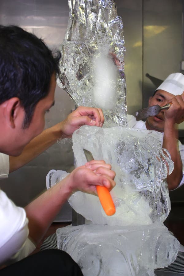Chef doing ice carving stock photo. Image of portrait - 9657360