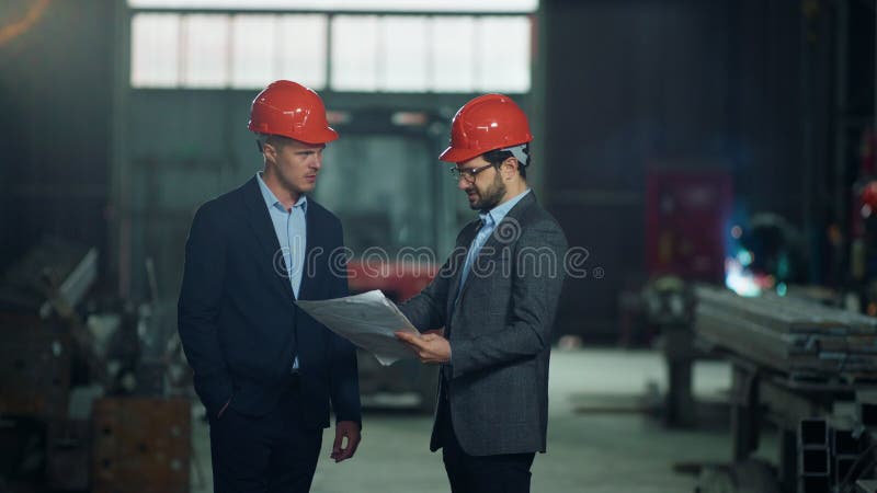 Chef Engineer and Architect Standing in the Middle of Production Zone ...